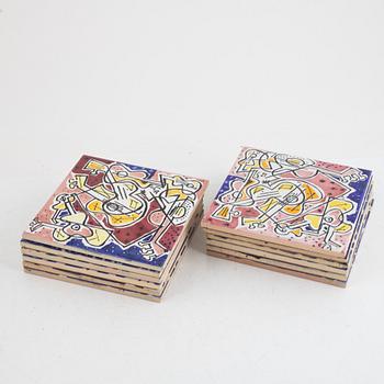 Salvador Dalí, after. A set of twelve earthenware tile plates, - Bukowskis