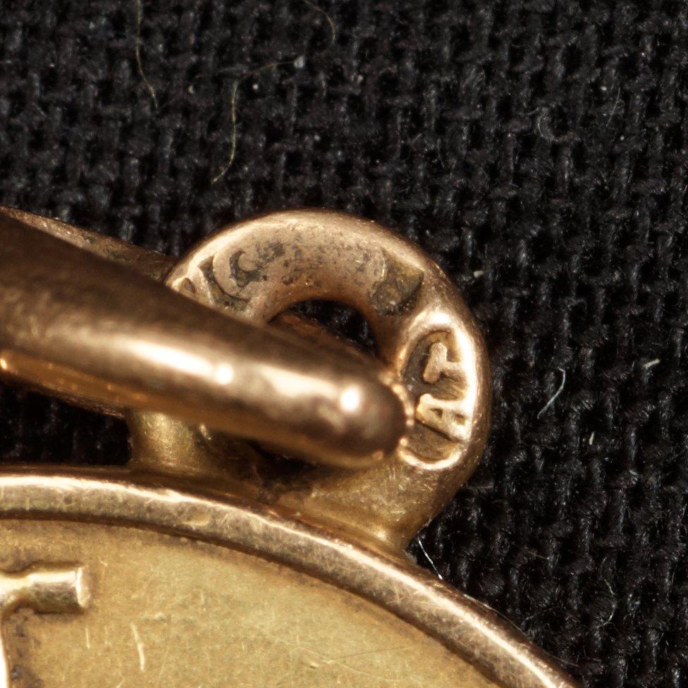 A Russian 20th century gold jetong, makers mark of Alfred Thielemann ...