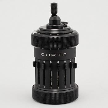 A Curta calculator, Type I, designed by Curt Herzstark för Cortina AG ...