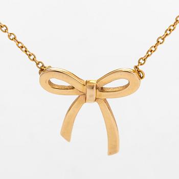 Tiffany & Co, an 18K necklace with a bow pendant. - Bukowskis