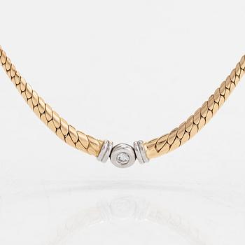 Collier, 14K guld, med en briljantslipad diamant ca 0.15 ct, Finska importstämplar. - Bukowskis