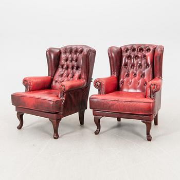 A pair of Rubelli leather armchairs later part of the 20th century ...