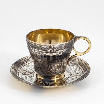 A silver-gilt teacup and saucer, mark of Vasily Semenov, Moscow 1862 ...