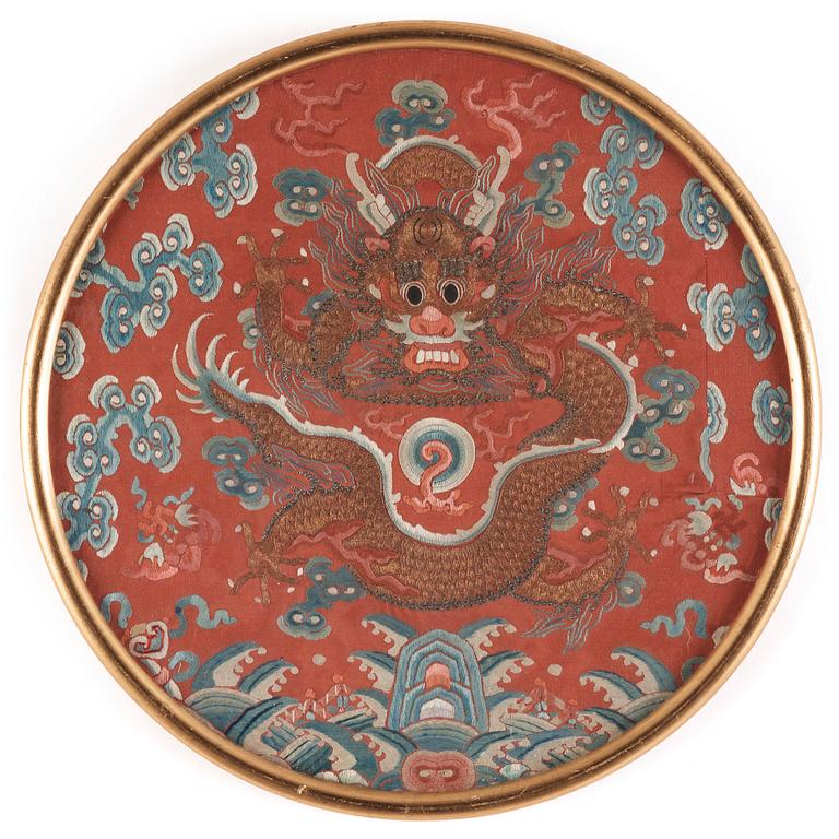 An embroidered dragon roundel from the surcoat of an Emperor or ...