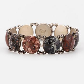 A silver and cabochon-cut porphyry bracelet. Bröderna Lundqvist ...