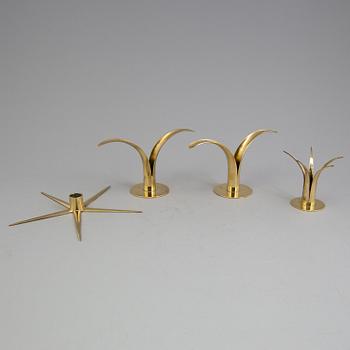 A set of four brass candlesticks, Ystad metall. - Bukowskis