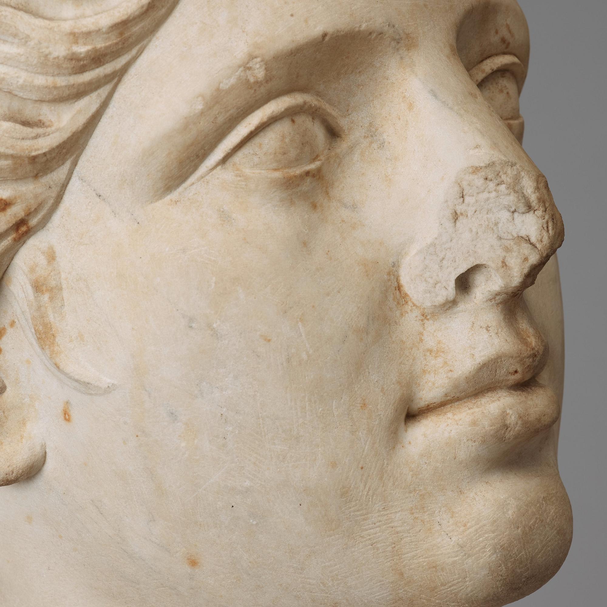 A marble portrait head of a woman with diadem, Roman 150 AD or later ie ...