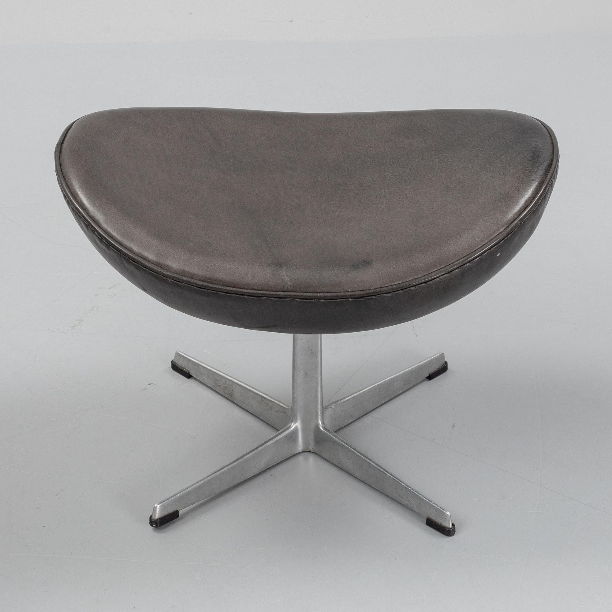 Arne Jacobsen, an 'Egg' swivel chair and ottoman, Fritz Hansen, Denmark ...