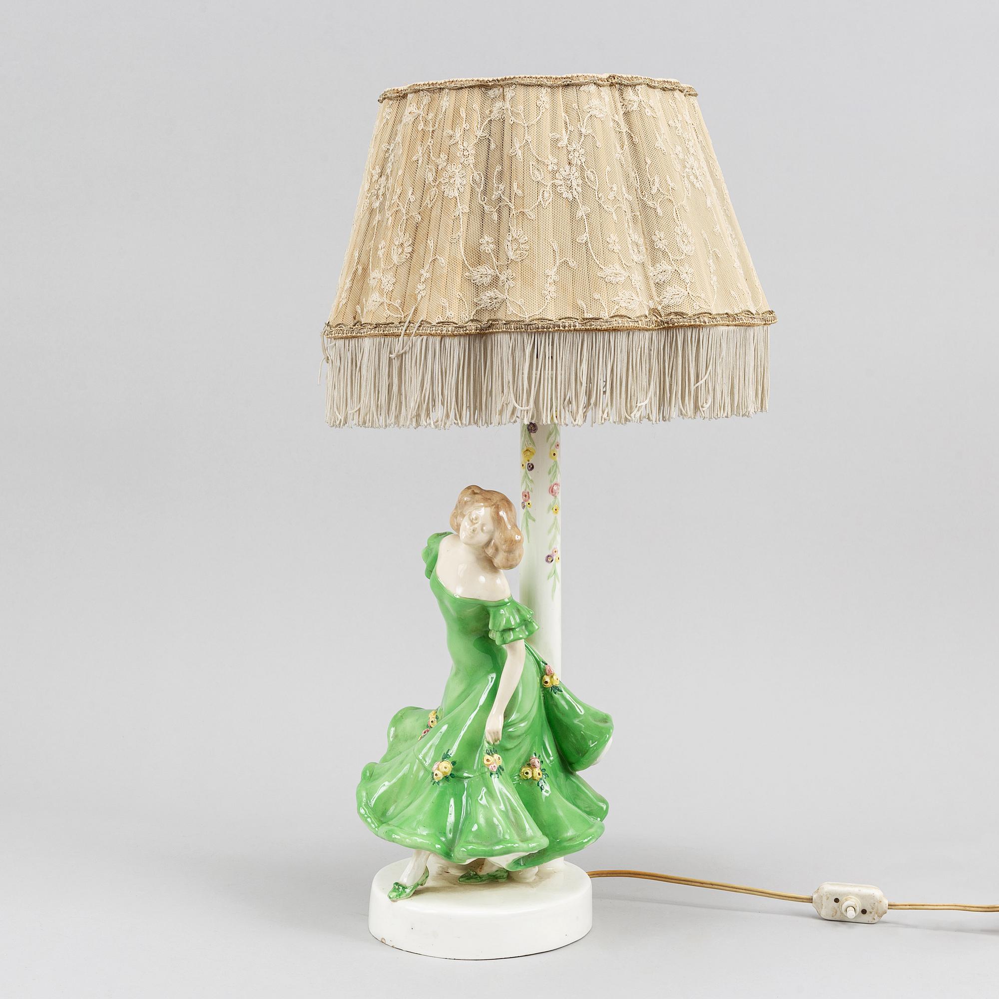 A creamware table lamp from Goldscheider, Austria, first half of the ...