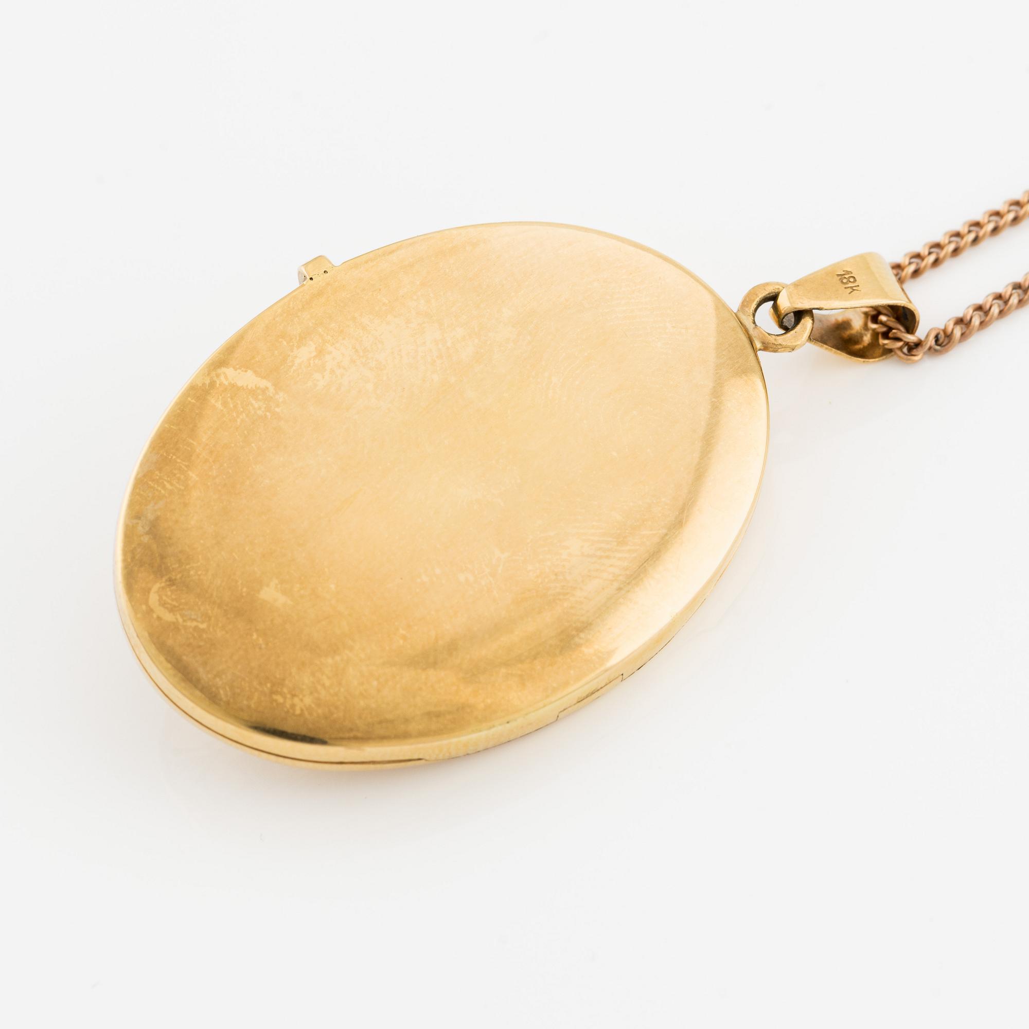 Medaljong/hänge 18K guld med en ametist. - Bukowskis