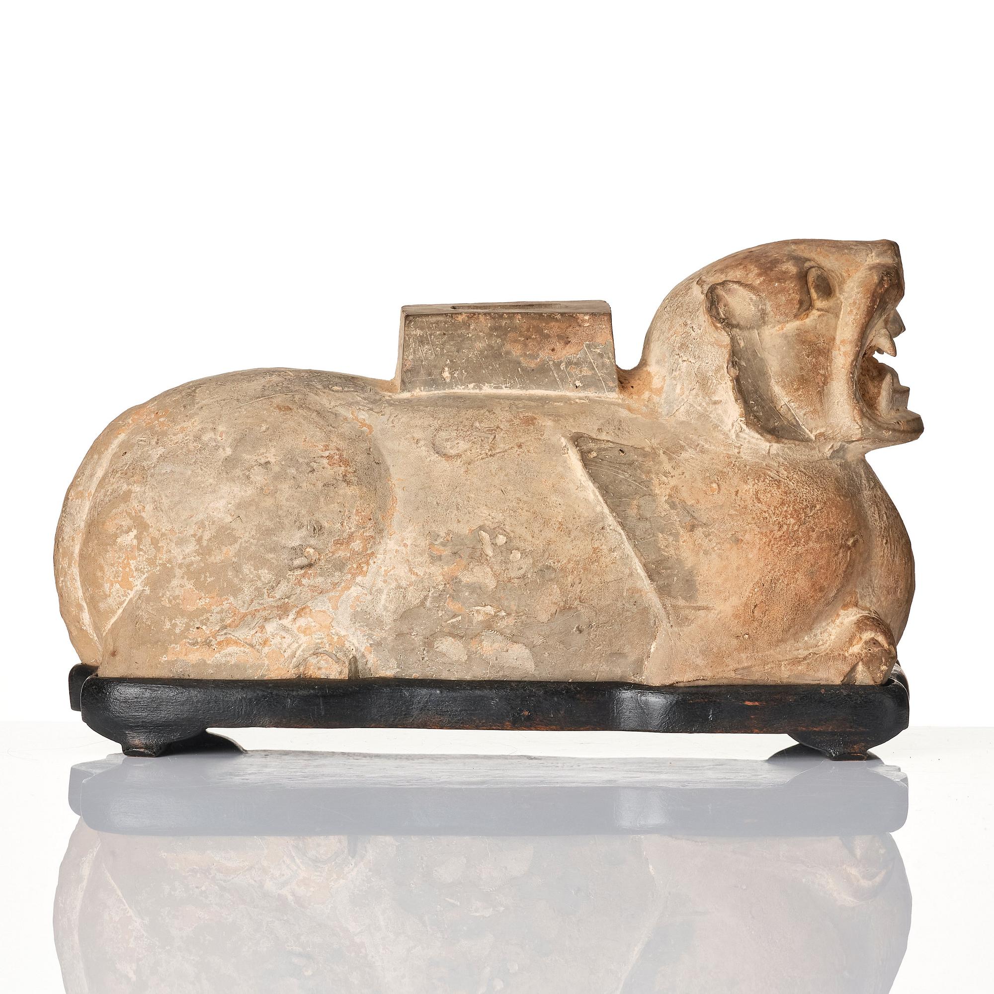 A pottery model of a recumant tiger/chimera, Han dynasty (206 BC-220 AD ...