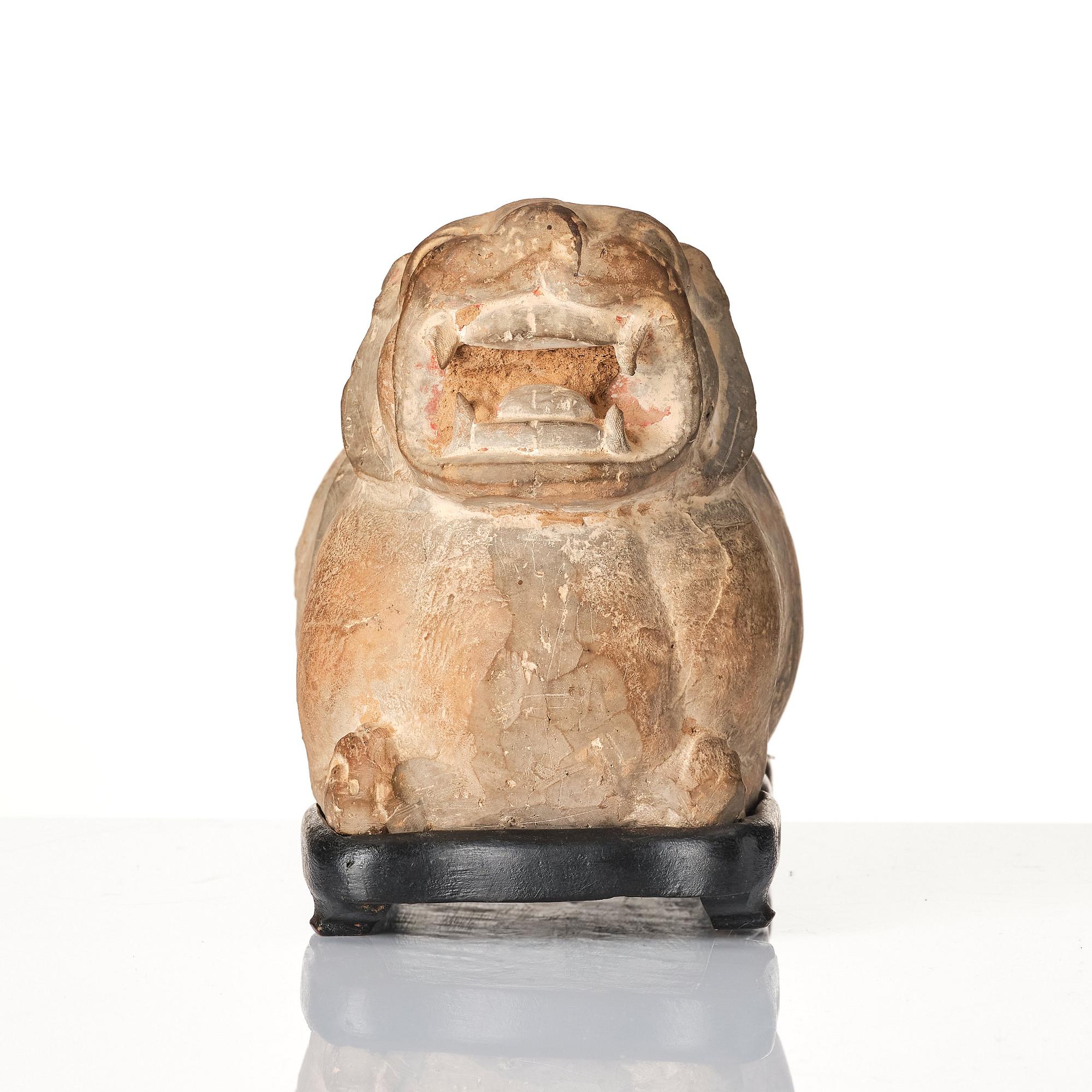 A pottery model of a recumant tiger/chimera, Han dynasty (206 BC-220 AD ...