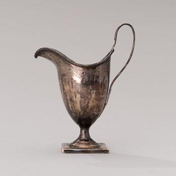 A REGENCY SILVER MILK JUG, London 1813. - Bukowskis