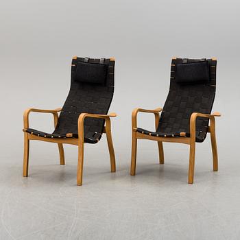 A pair of Yngve Ekström easy chairs, Swedese, second half of the 20th ...