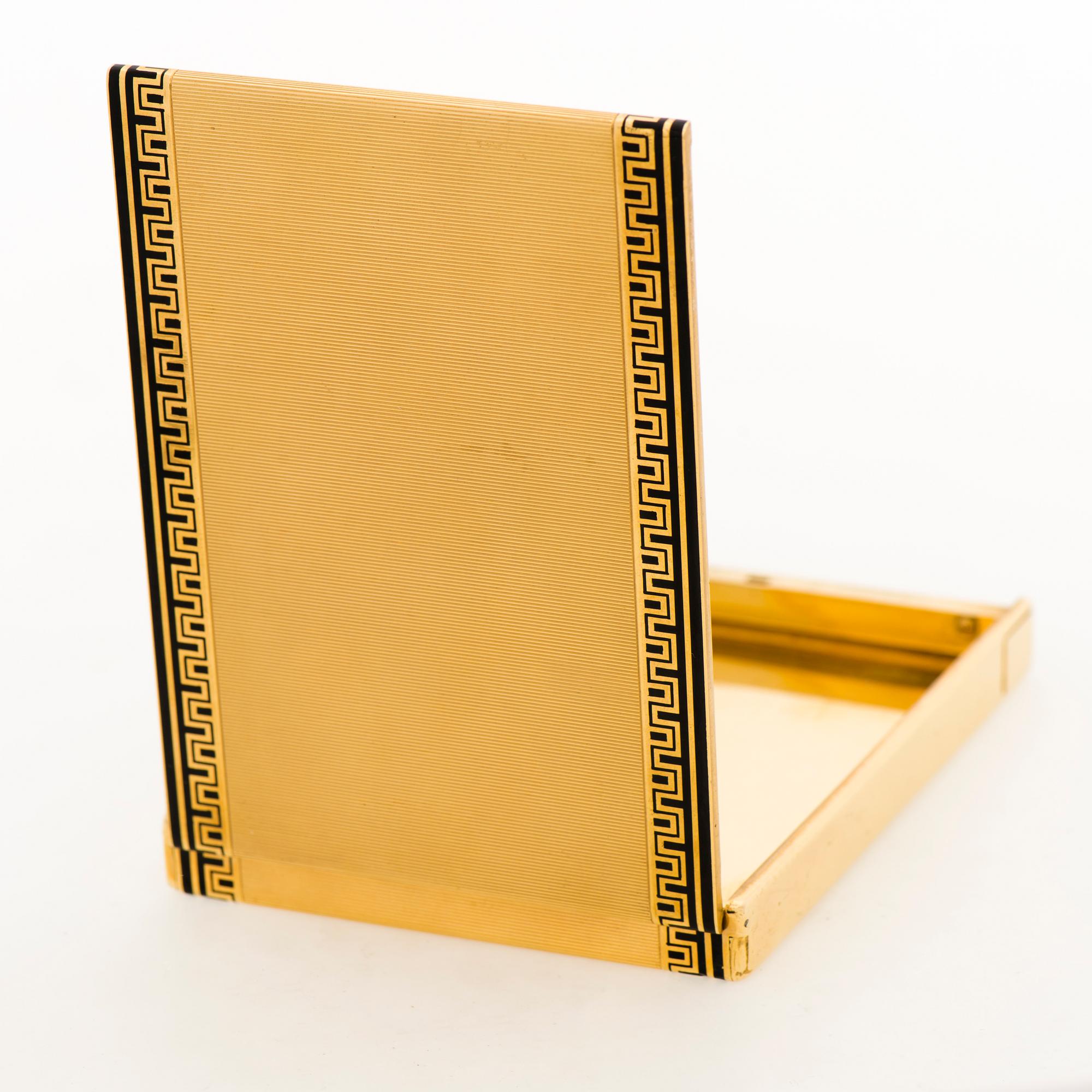 A Cartier cigarette case in 18K gold with black enamel. - Bukowskis