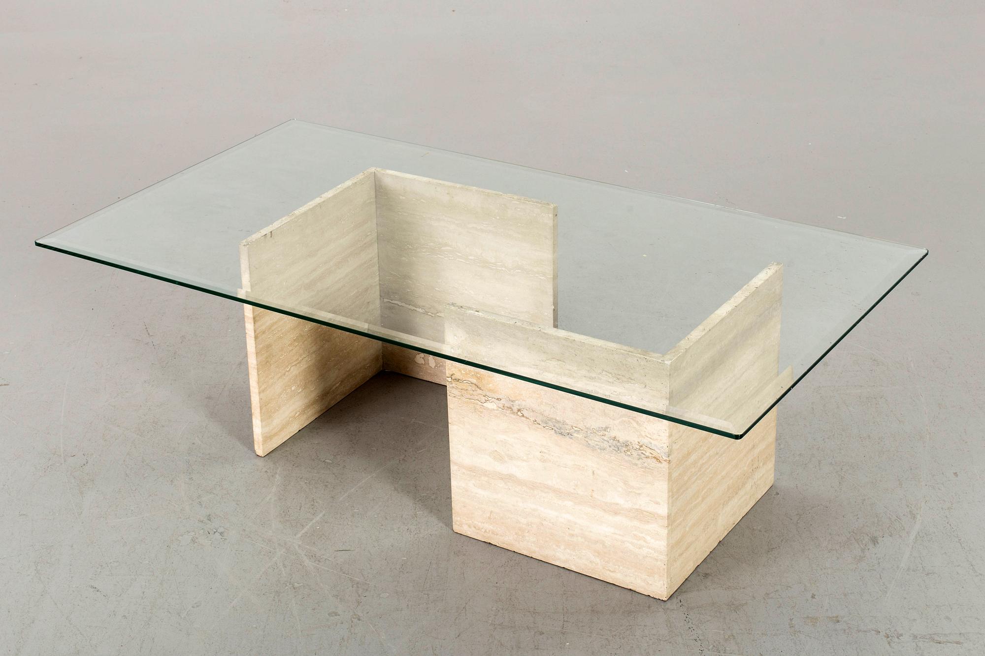 A TRAVERTINE AND GLASS SOFA TABLE. - Bukowskis