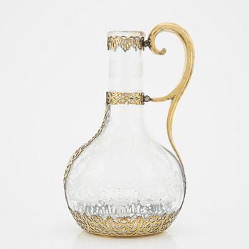 An English parcel-gilt silver and glass decanter, mark of Charles ...