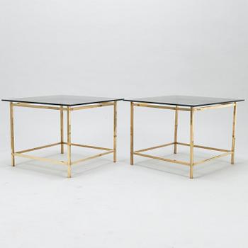 A pair of latter half of the 20th Century brass side tables with glass ...