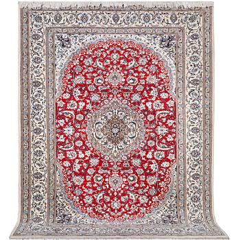 A Nain carpet, part silk, c. 340 x 248 cm. - Bukowskis