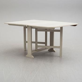 A 19th century painted gate leg table. - Bukowskis