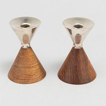 A pair of silver and teak candle lights by Tapio Wirkkala, 1959/1960 ...