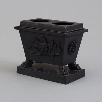An Empire cast iron ink well in the shape of Napoleon's sarcophagus ...
