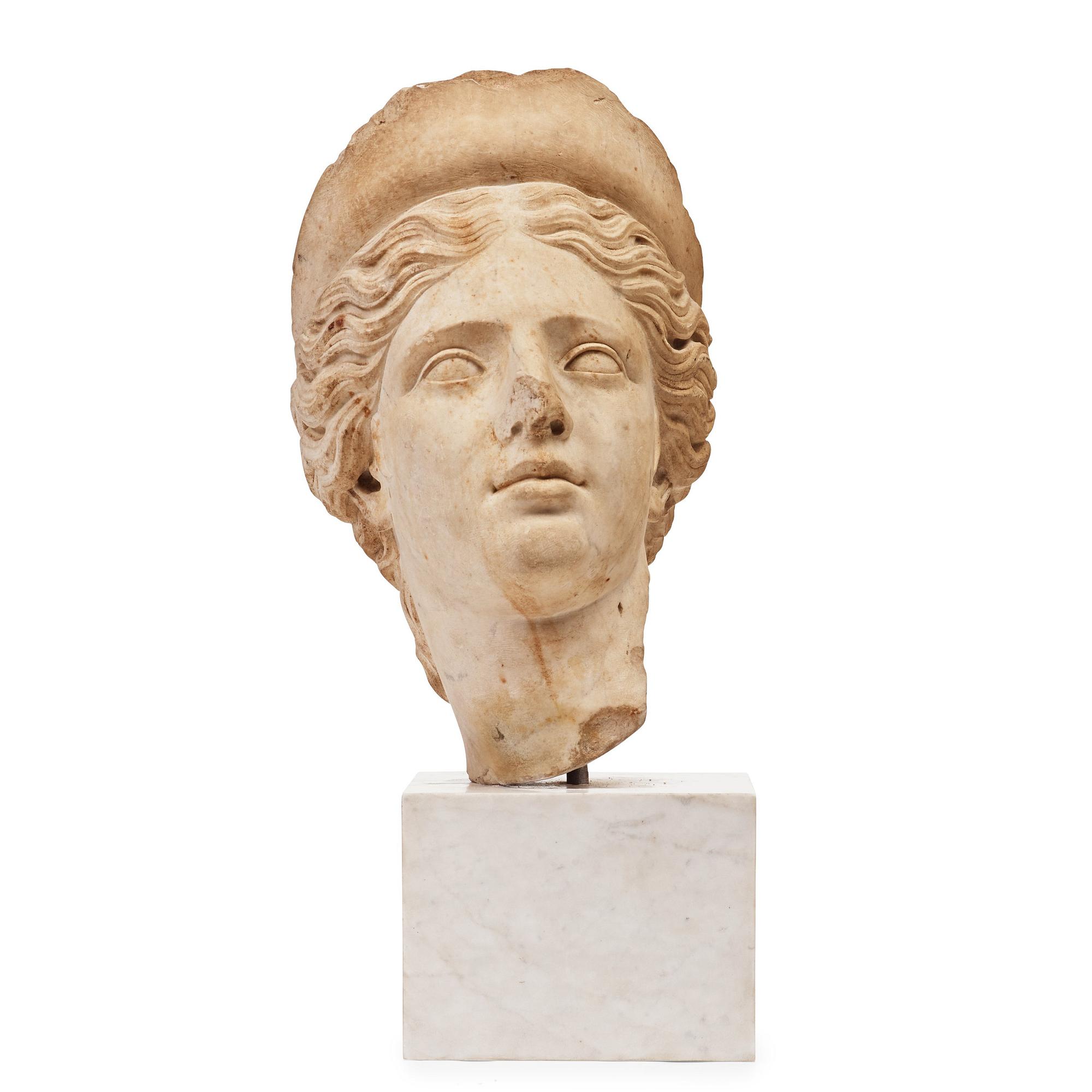 A marble portrait head of a woman with diadem, Roman 150 AD or later ie ...