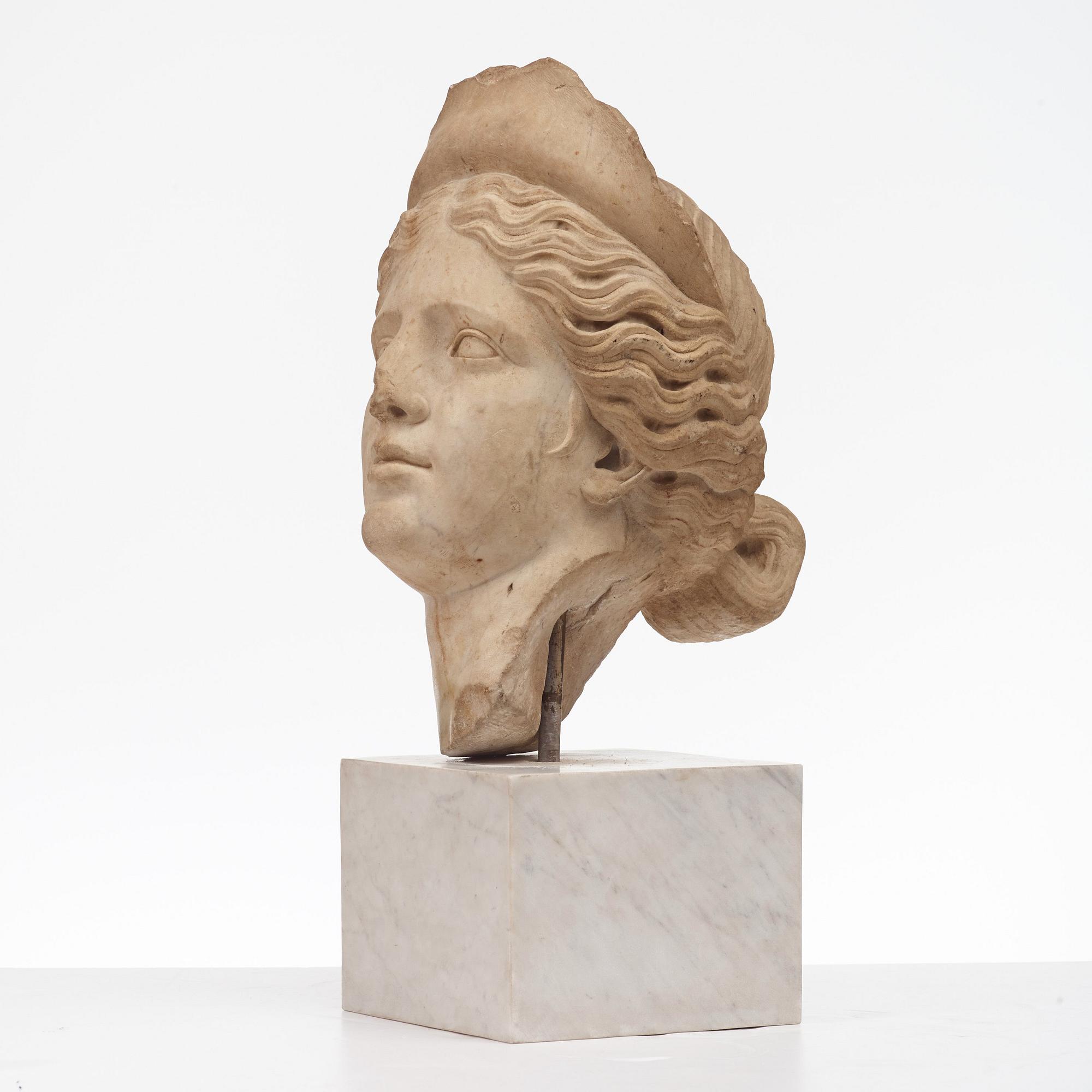 A marble portrait head of a woman with diadem, Roman 150 AD or later ie ...