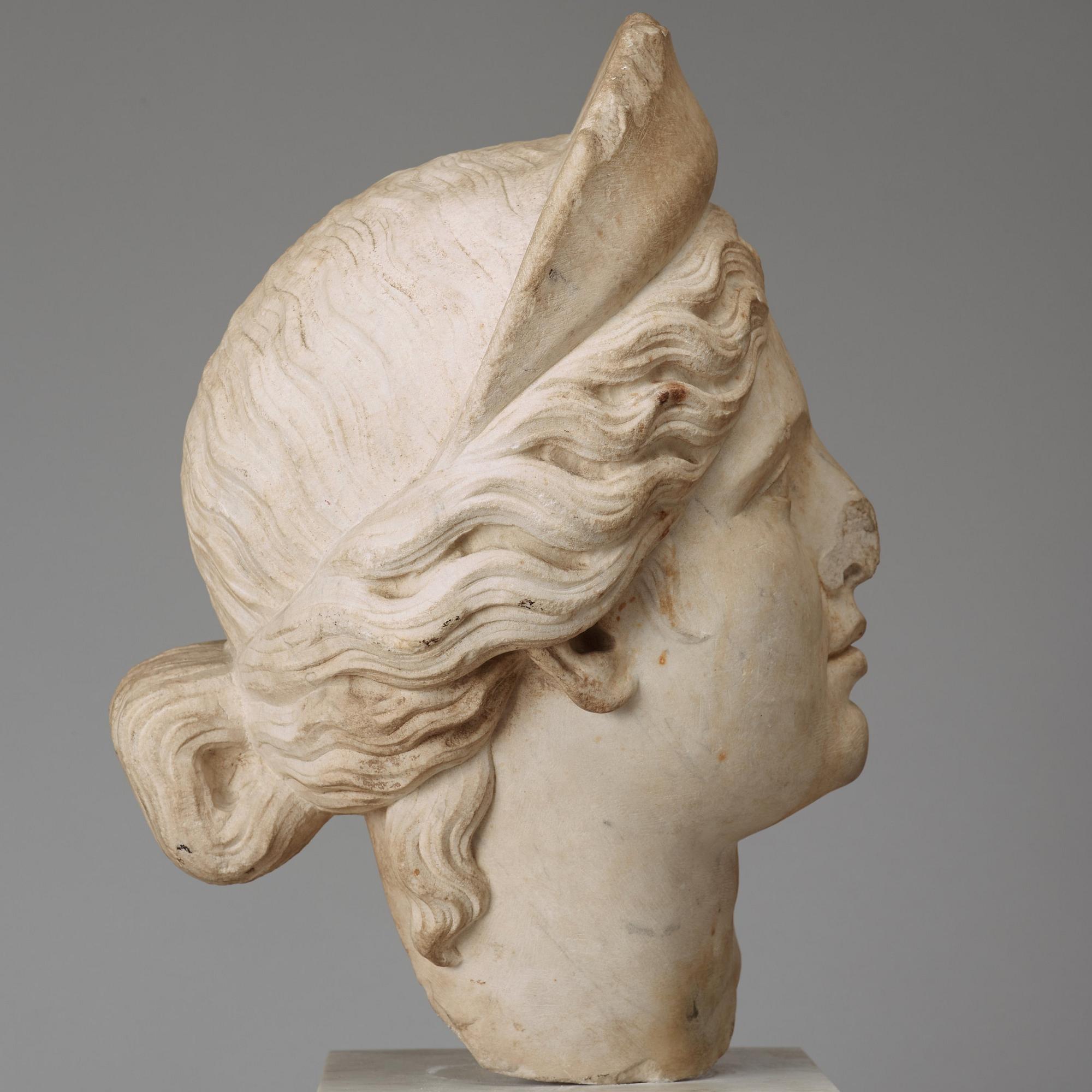 A marble portrait head of a woman with diadem, Roman 150 AD or later ie ...