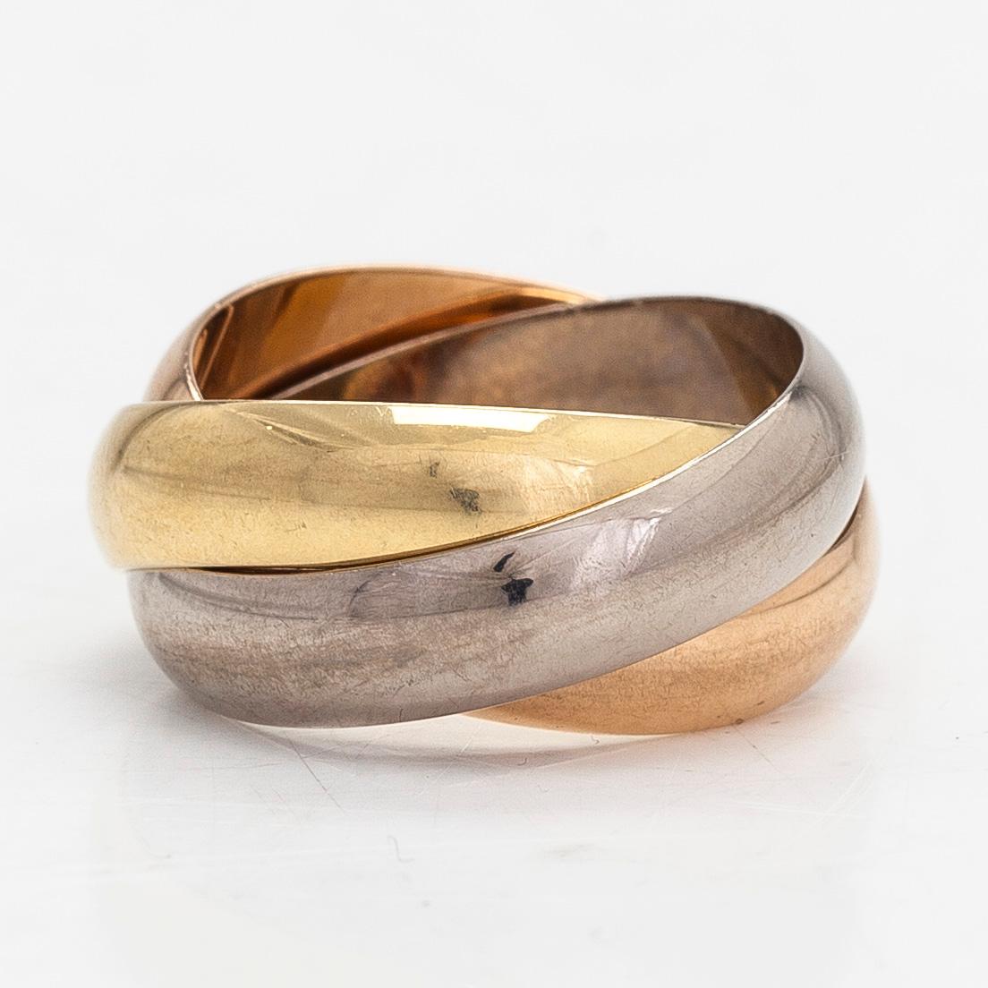 Cartier, ring, "Trinity", 18K guld i tre färger. - Bukowskis