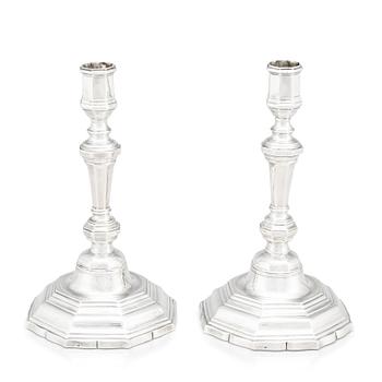 A pair of French silver candlesticks. Marks of Antoine Bailly. With ...