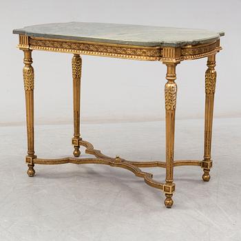 An early 20th CenturyLouis XVI style table with stone top. - Bukowskis