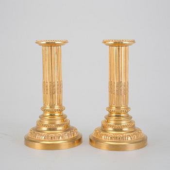 A pair of brass candlesticks, late 20th Century. - Bukowskis