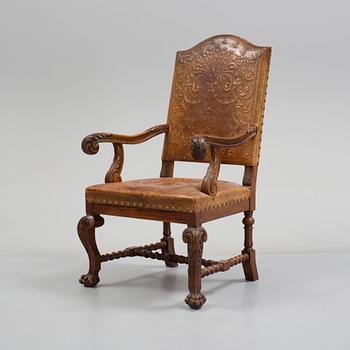 A circa 1900 baroque style armchair. - Bukowskis