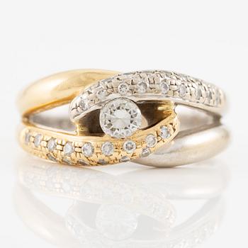 Ring 18K guld med runda briljantslipade diamanter. - Bukowskis