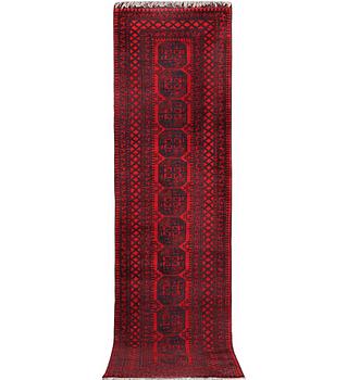 An Afghan runner carpet, c. 380 x 94 cm. - Bukowskis