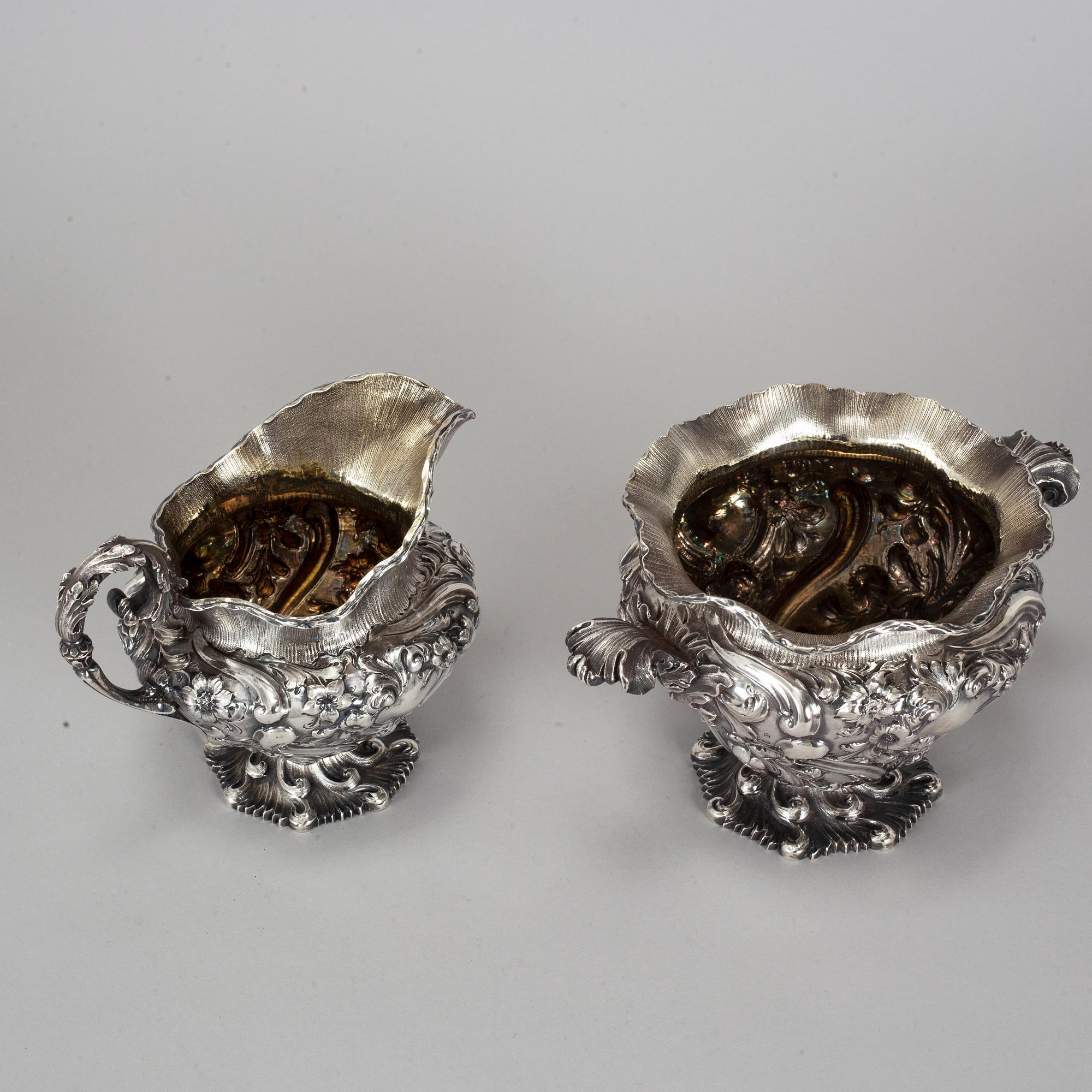 A silver tea pot, sugar bowl and creamer, Charles Fox II, London 1832 ...