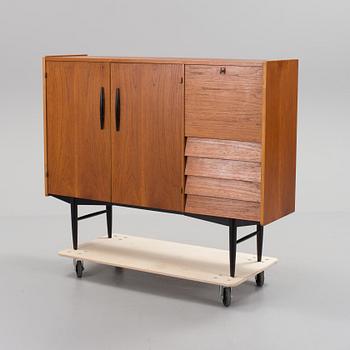 A 1960s cupboard by Nils Johnsson, Troed, Sweden. - Bukowskis