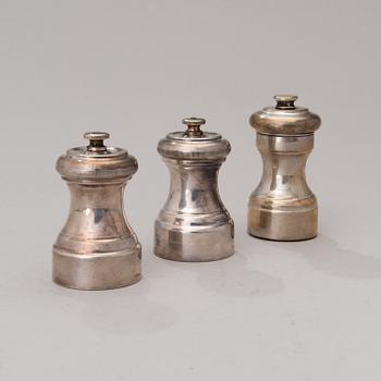 Three Peugeot pepper mills, silver and silver plate, France, latter ...