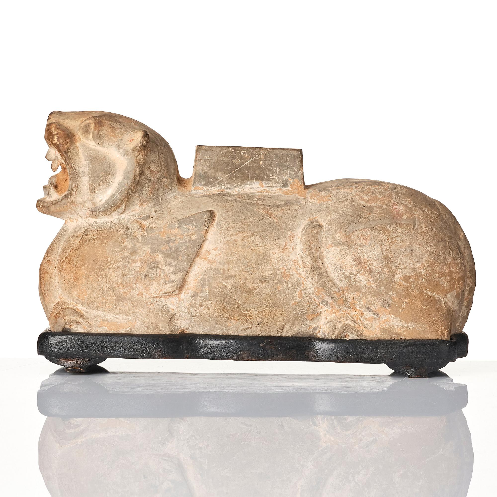 A pottery model of a recumant tiger/chimera, Han dynasty (206 BC-220 AD ...