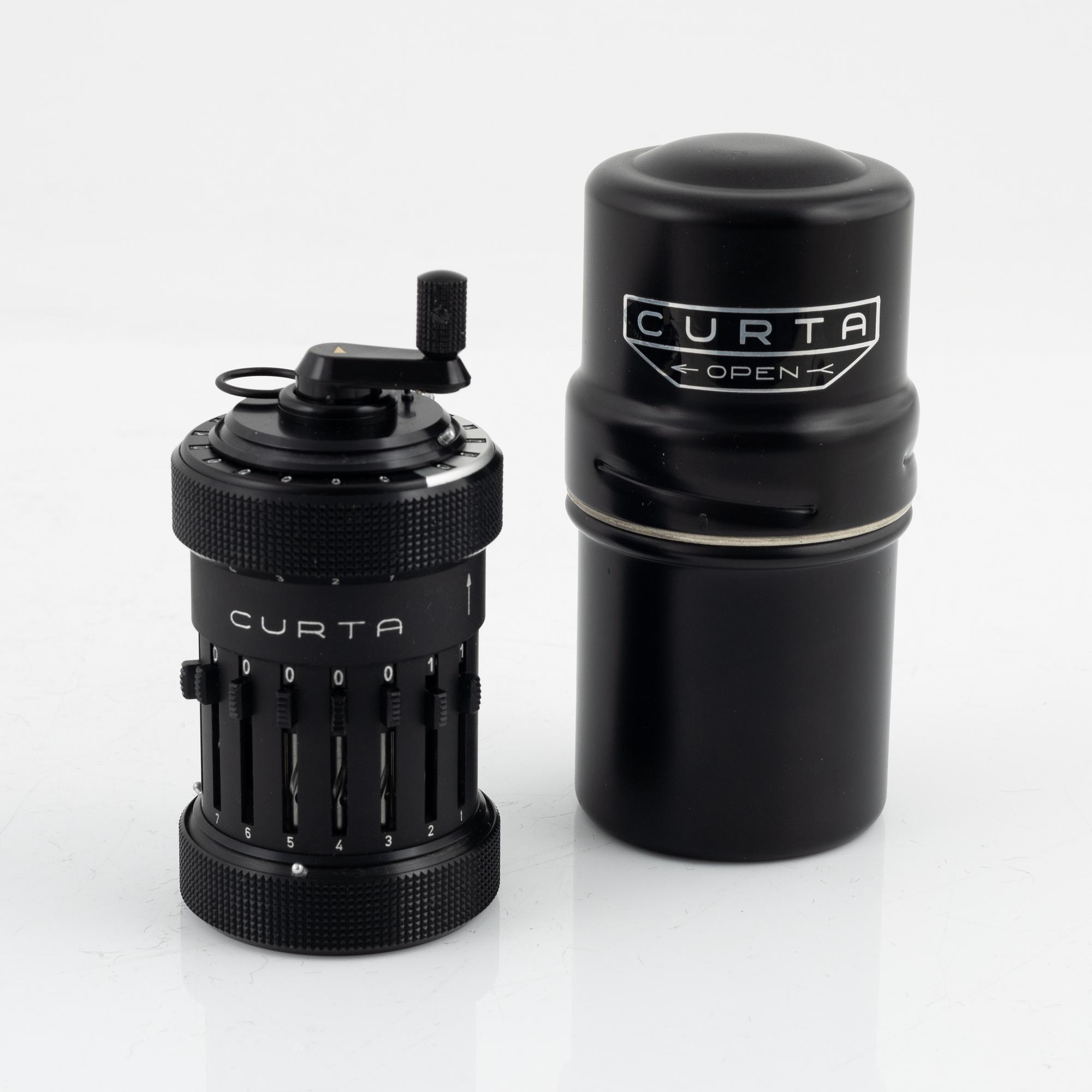 A Curta Type I mechanical calculator. - Bukowskis