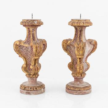 A pair of carved Baroque pricket candlesticks, first part of the 18th ...