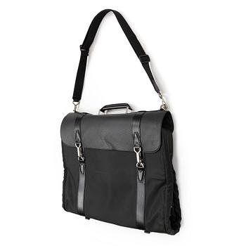 Louis Vuitton, a Taiga and nylon garment bag. - Bukowskis
