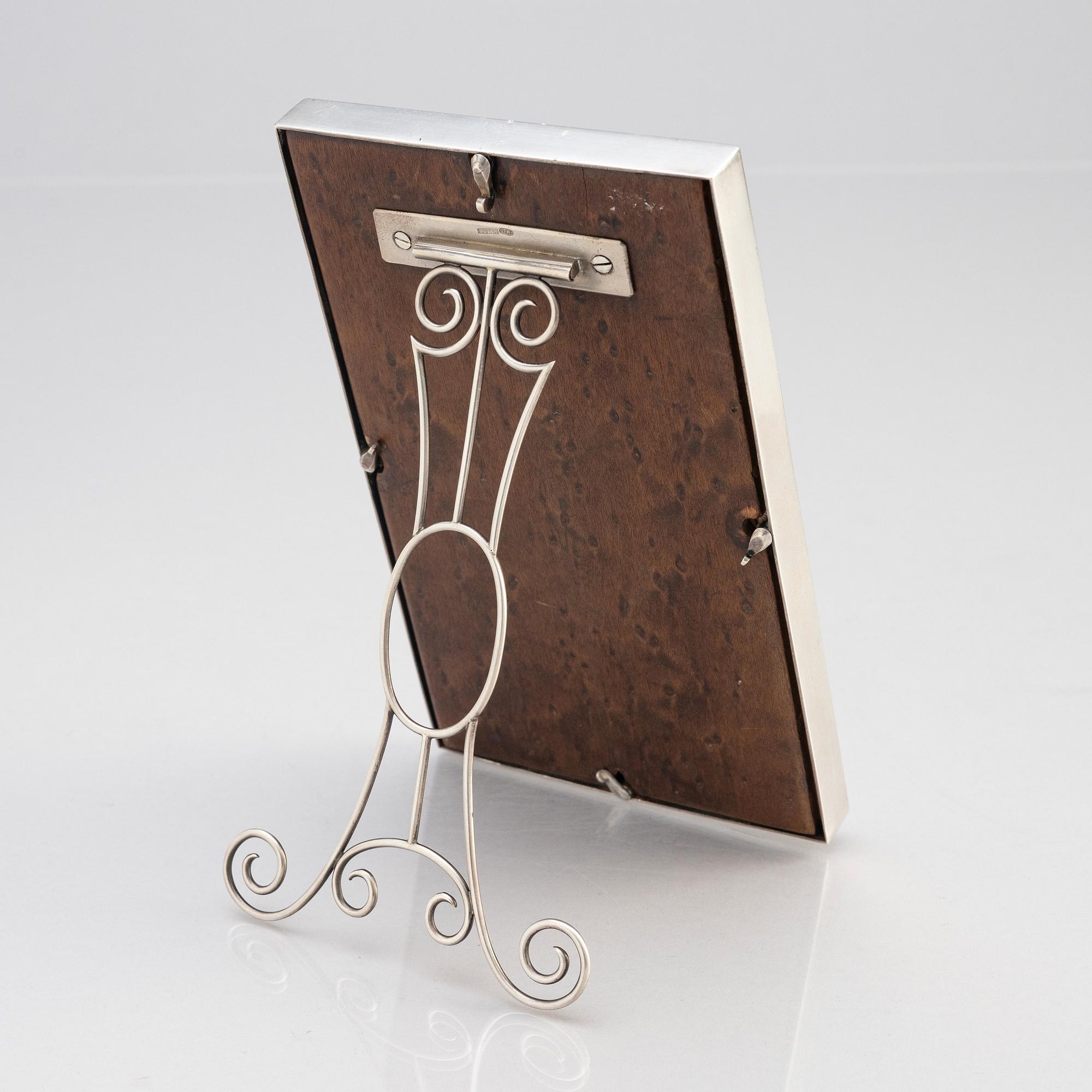 An exquisite jewelled and enamelled silver frame, assay master Ivan ...
