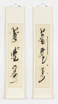 A couplet of scrolls, ink on paper, presumably Mongolia, 20th century ...