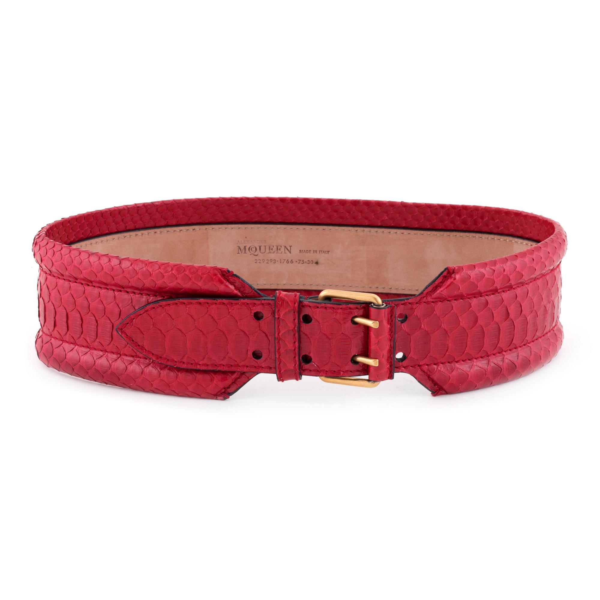 ALEXANDER MCQUEEN, a red python belt. - Bukowskis