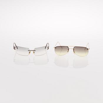 AURINKOLASIT, 2 kpl, Chanel ja Gucci. - Bukowskis