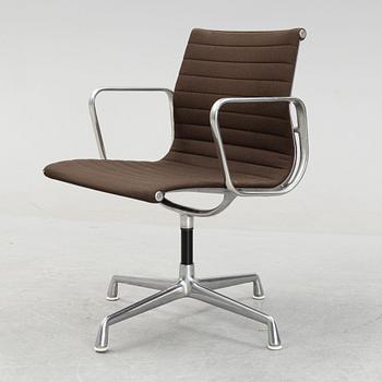 A model EA 108 swivel armchair by Charles and Ray Eames for Herman ...