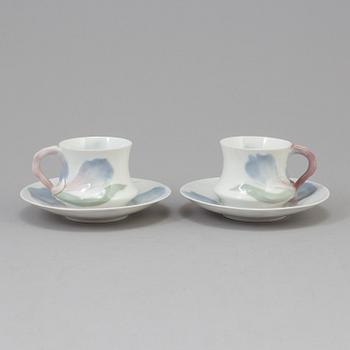 A pair of Alf Wallander "Iris" porcelain coffee cups from Rörstrand ...