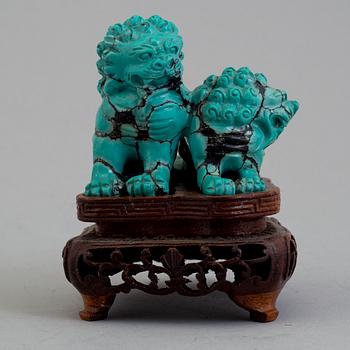 A Chinese carved turquoise sculpture, 20th century. - Bukowskis